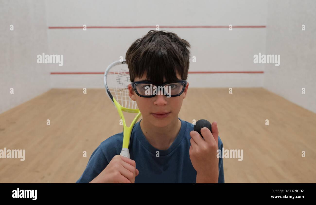 Young boys play squash Stock Photo - Alamy