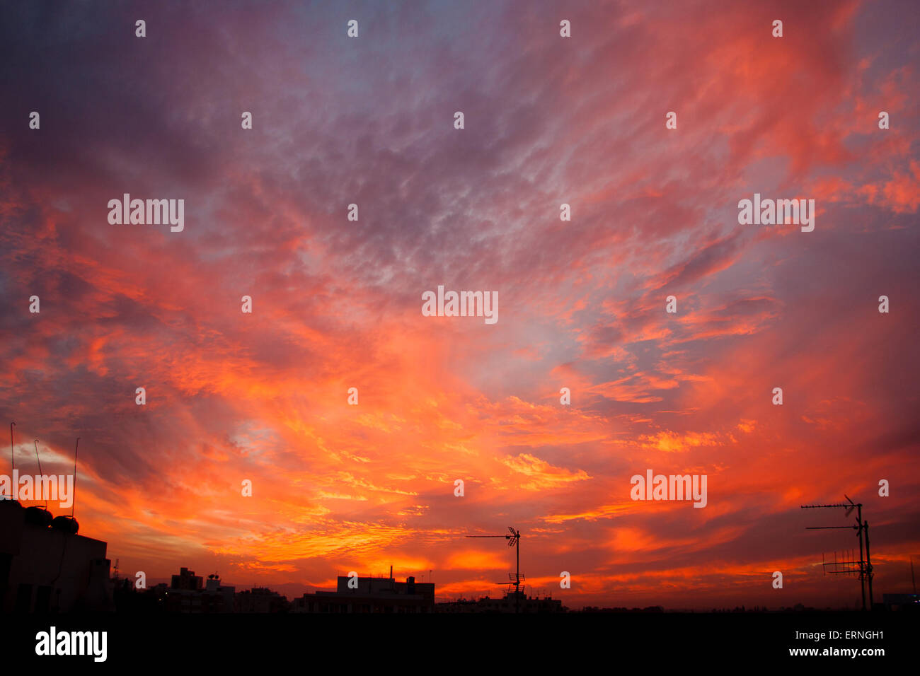 Sunset sky over the cityscape of Nicosia, Island of Cyprus Stock Photo ...