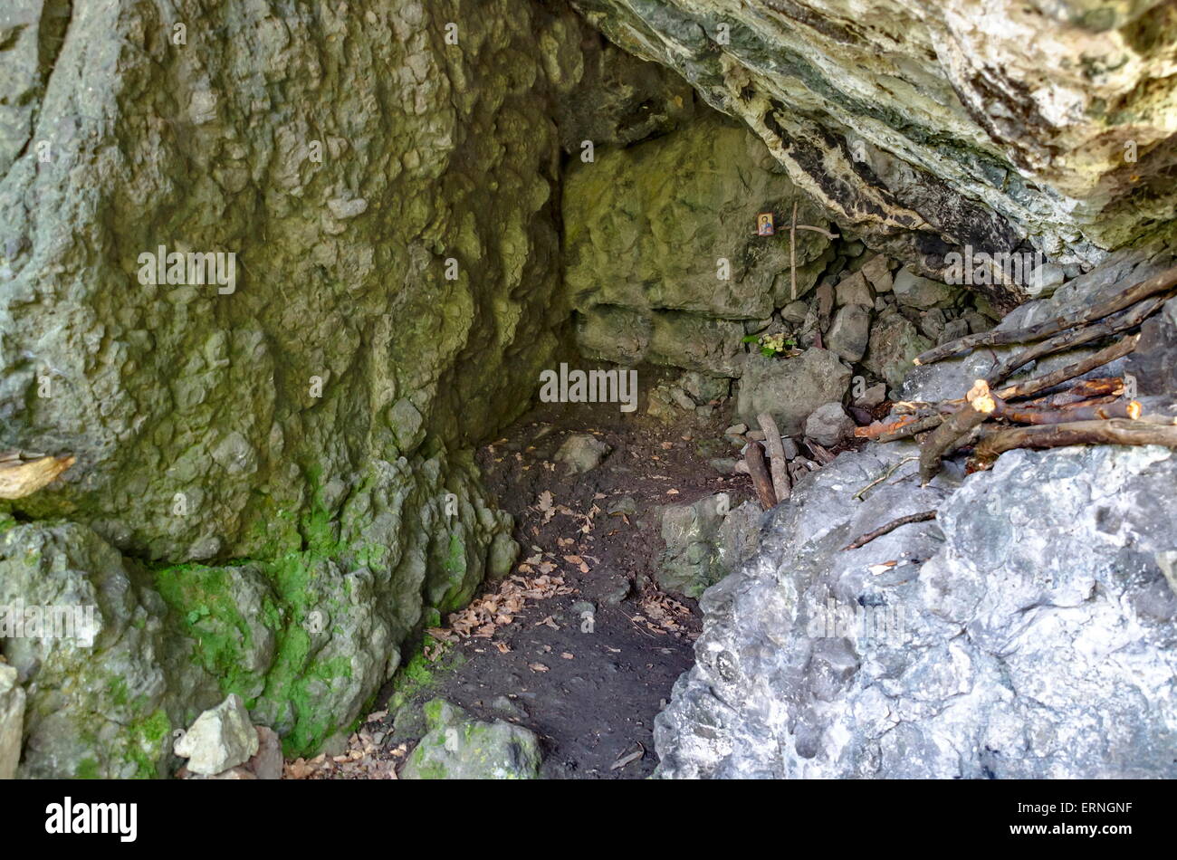 Small cave rock beautiful shelter with christian icon and conditions of ...