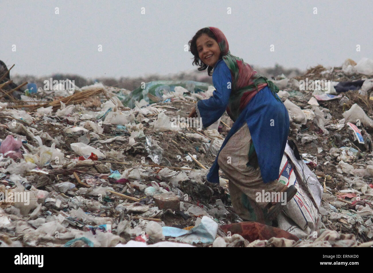 Lahore, Pakistan. 05th June, 2015. Gypsy rag-pickers search for ...