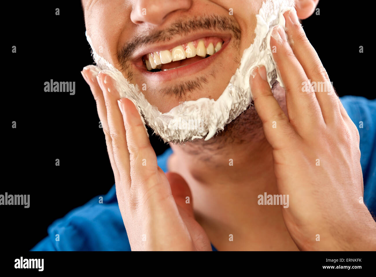 smiling man with shaving foam Stock Photo - Alamy