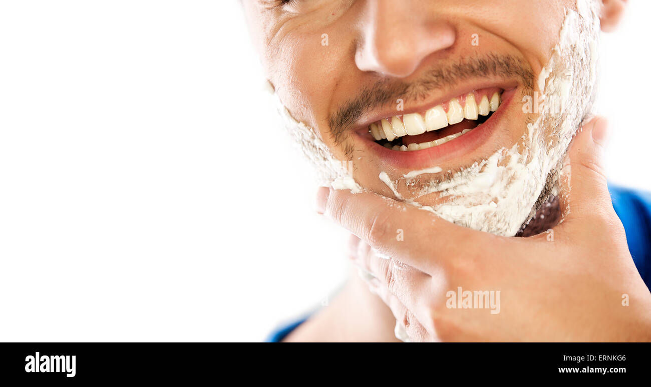 smiling man with shaving foam Stock Photo - Alamy