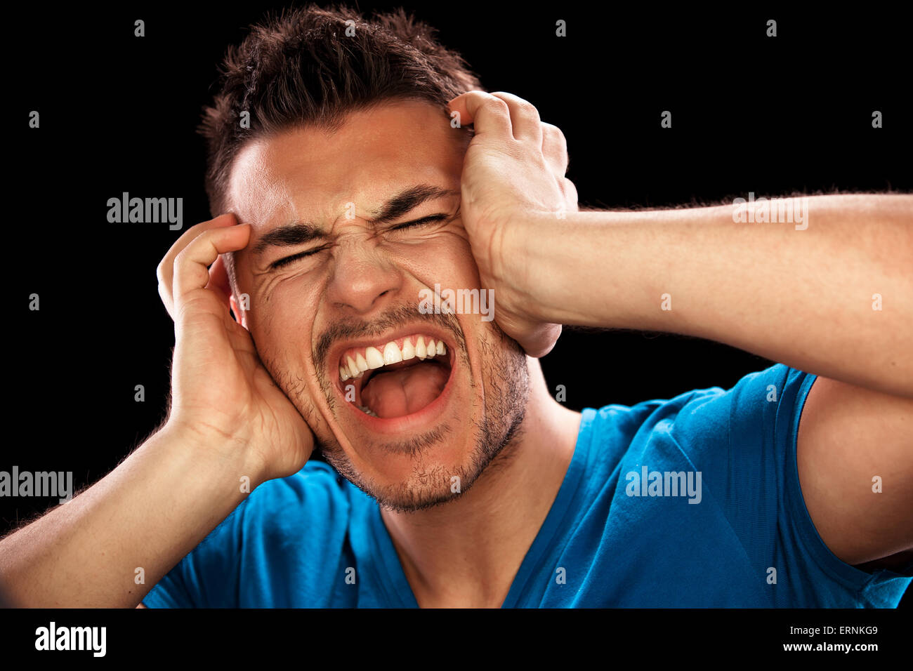 man holding his head Stock Photo - Alamy