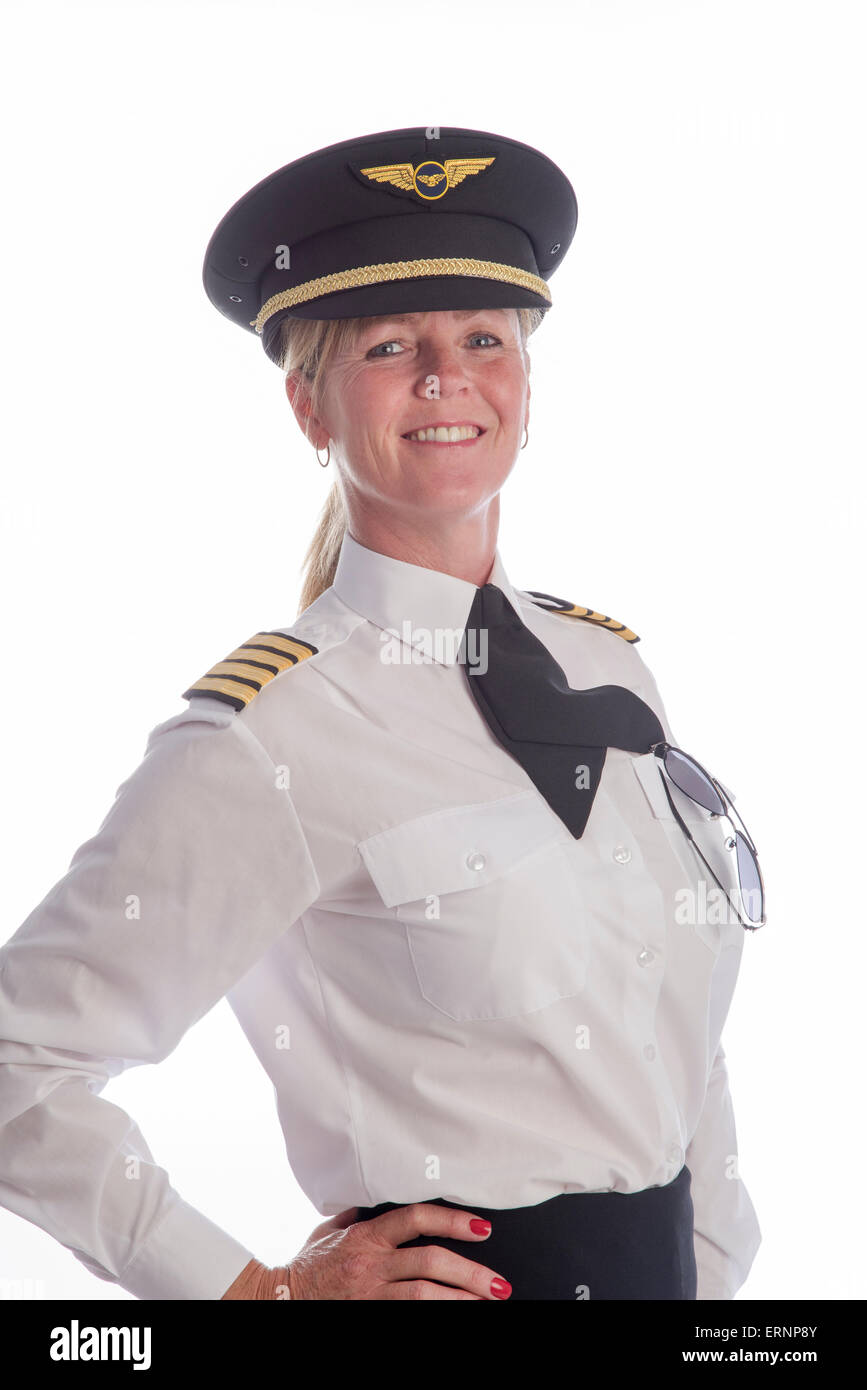 Attractive mid age female airline pilot in uniform Stock Photo - Alamy