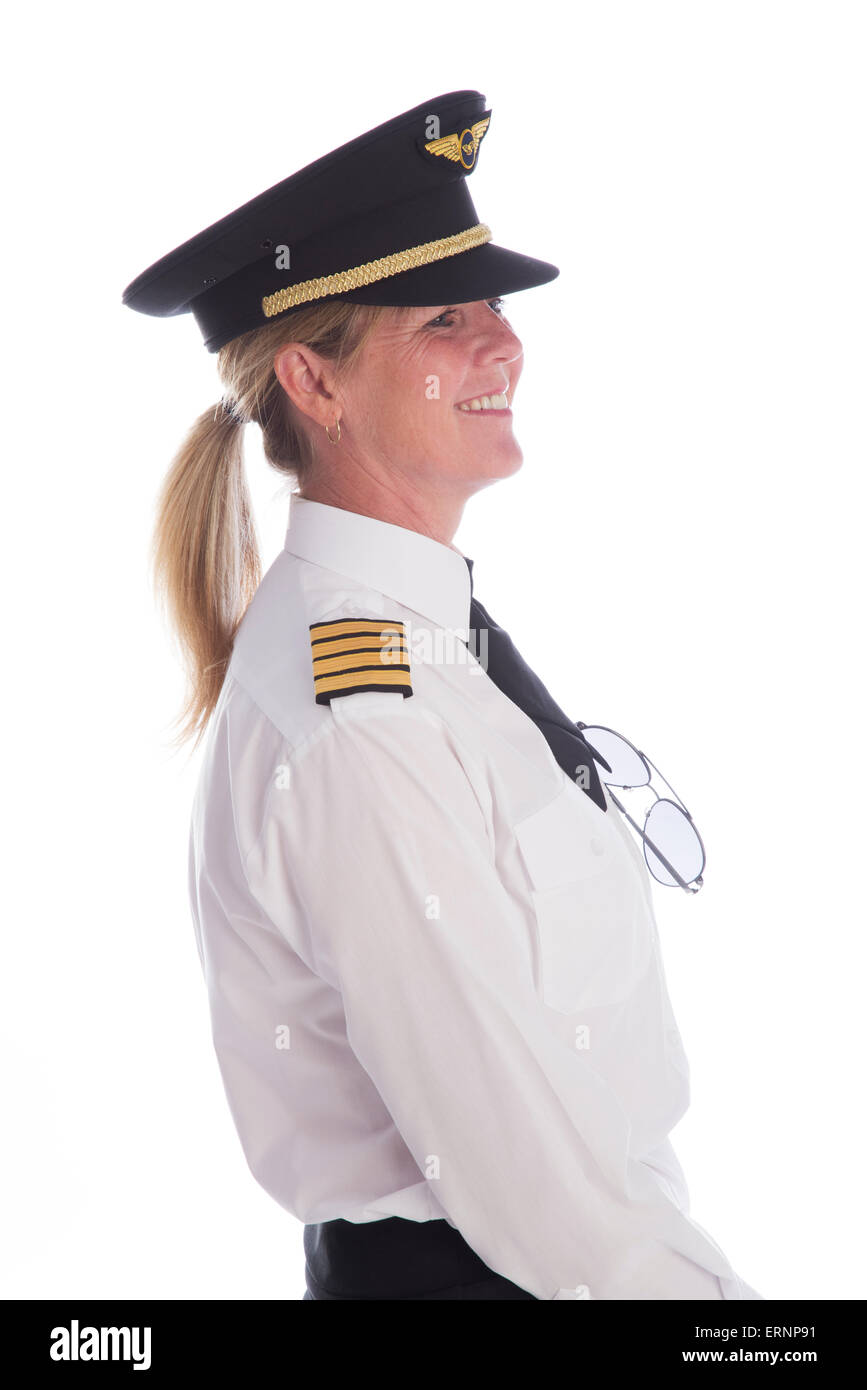 Attractive mid age female airline pilot in uniform Stock Photo - Alamy