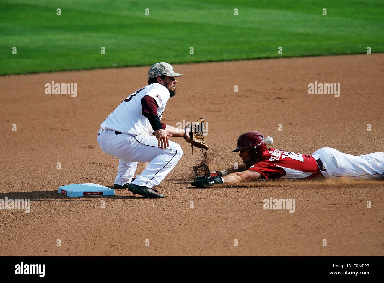 Fayetteville, AR. 5th June, 2015. Bears infielder Dylan Becker #27 goes ...