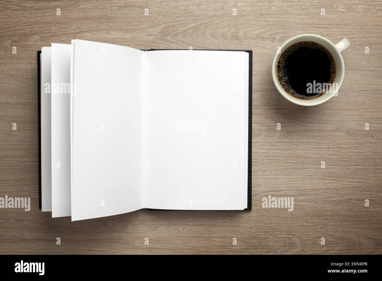 Open book on office desk Stock Photo - Alamy