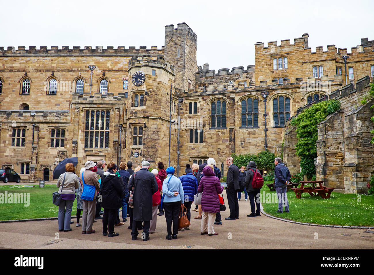 Group Tour Around Durham Castle Palace Green Durham UK Stock Photo - Alamy