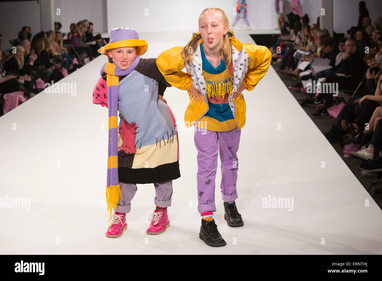 Two models walk runway during hi-res stock photography and images - Alamy