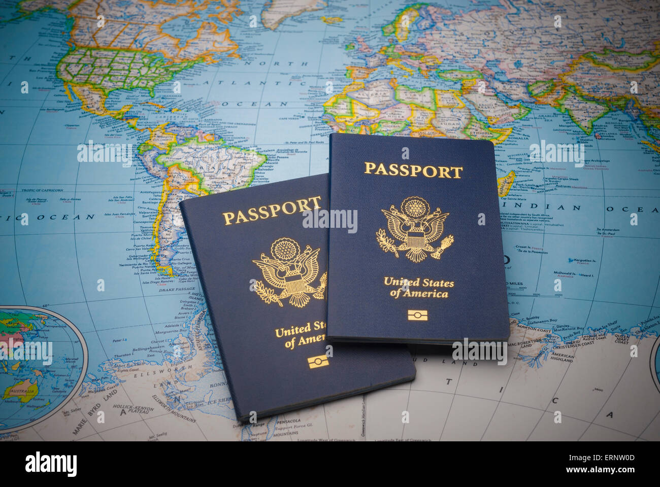 Passports on a map of the world with limited depth of field Stock Photo ...