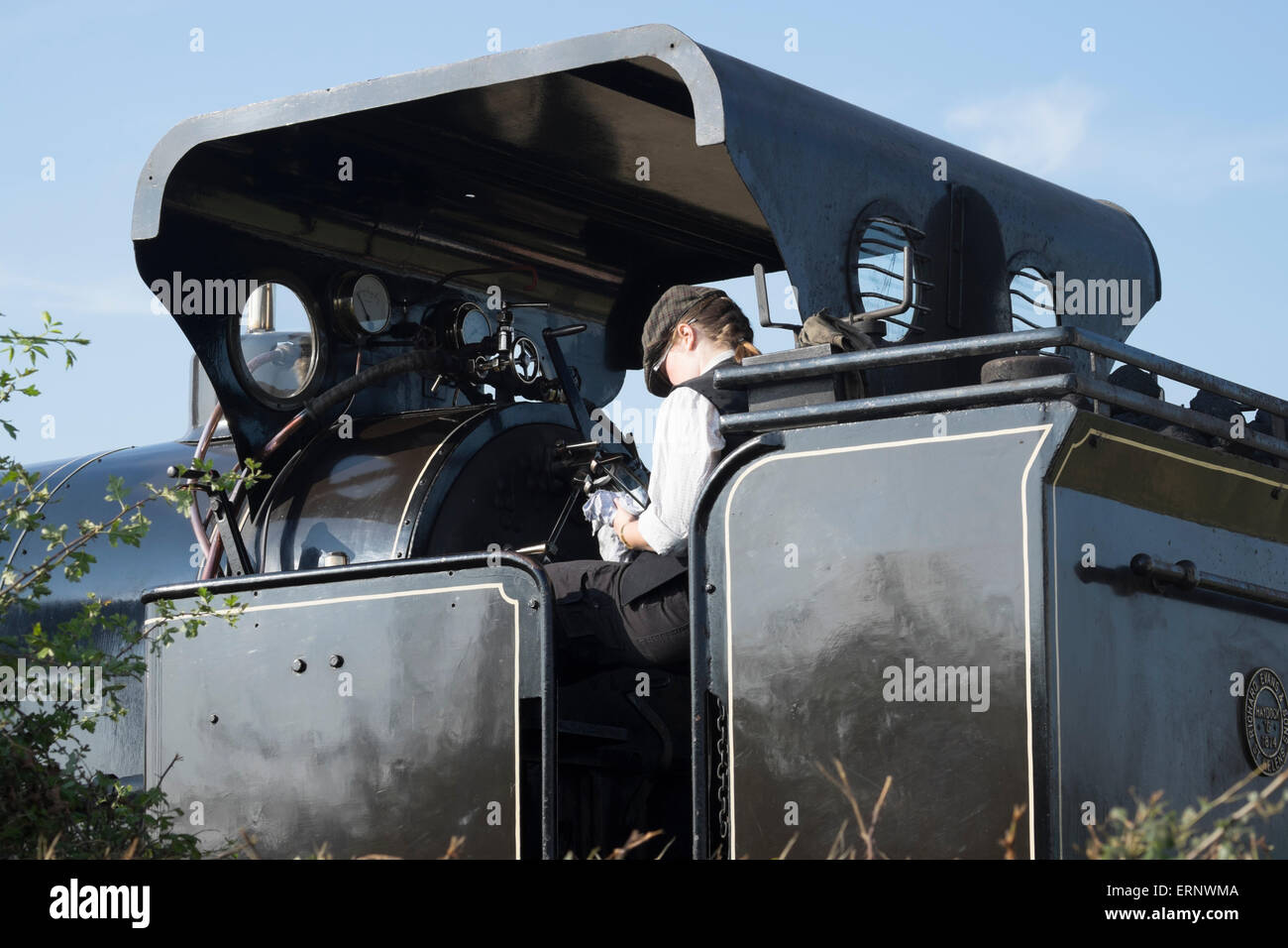 Girl driving a steam engine at Welland Steam Rally in Worcestershire ...