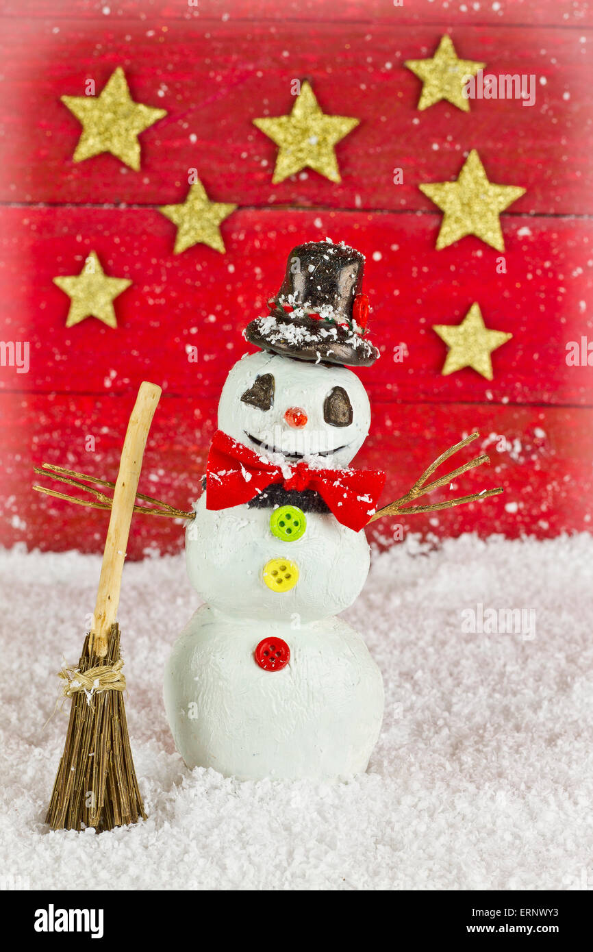 Snowman on red background with stars Stock Photo - Alamy