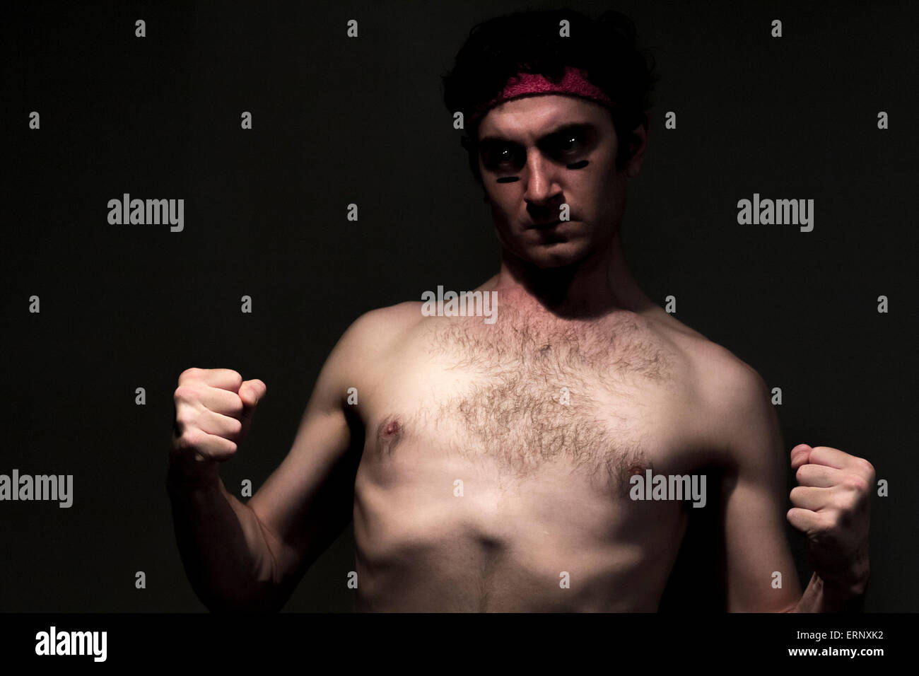 Muscles man skinny man hi-res stock photography and images - Alamy