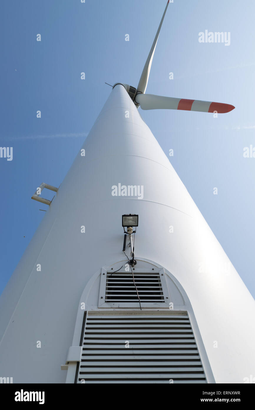 single wind turbine produces green clean energy Stock Photo - Alamy