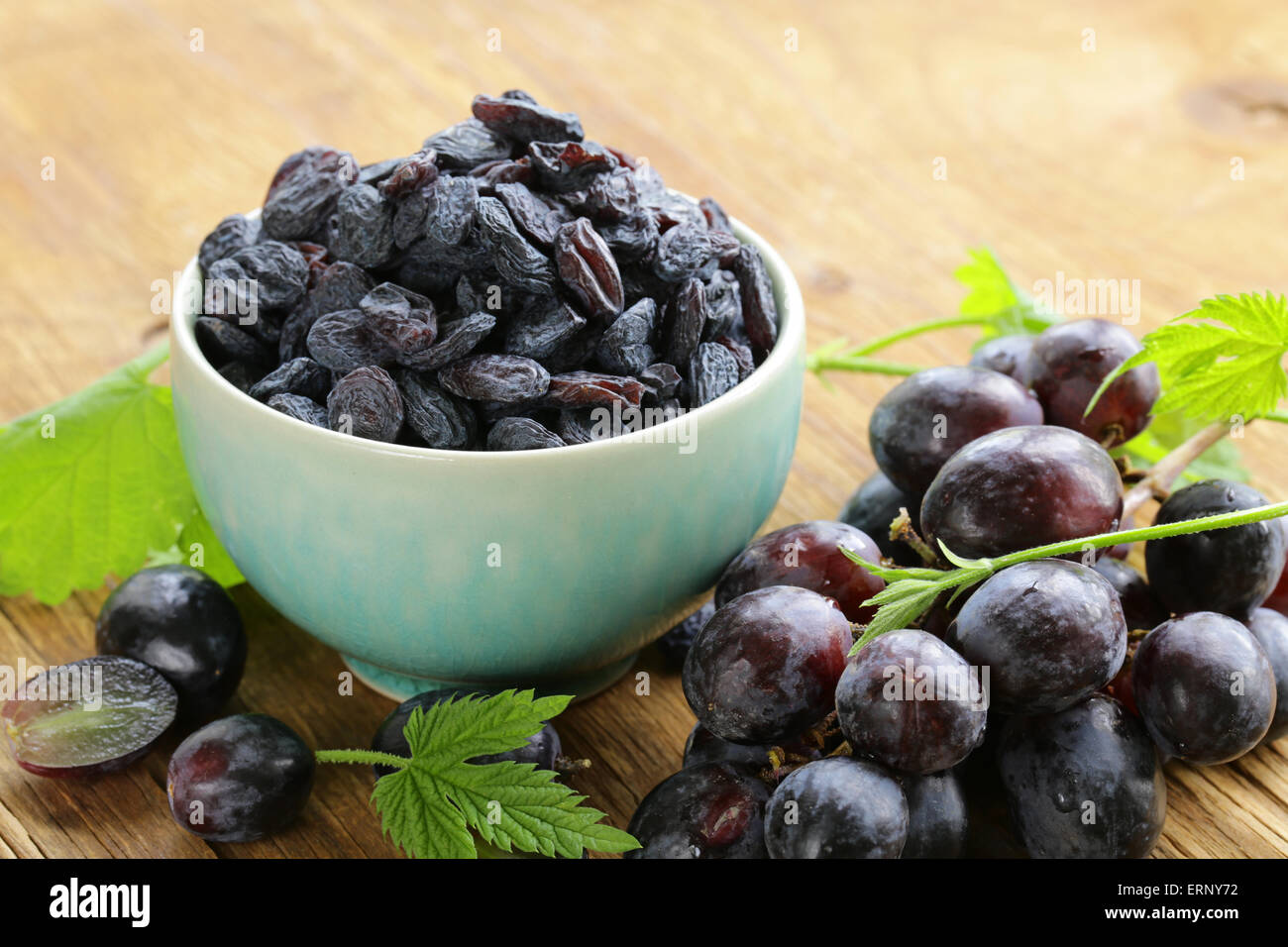 Natural organic dried grapes raisins, rustic still life Stock Photo - Alamy