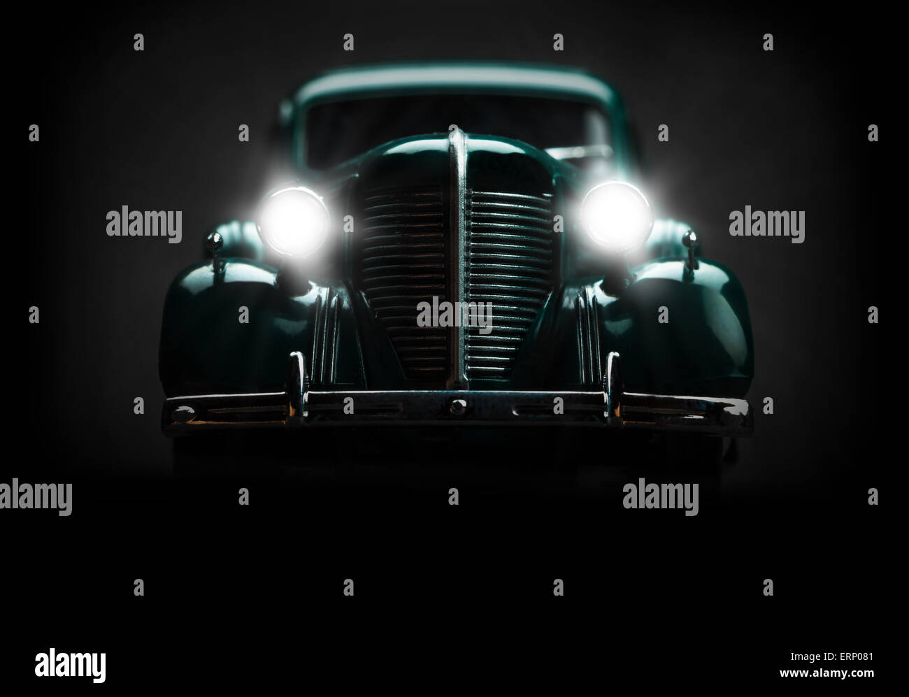 retro car with included lights on a dark background Stock Photo - Alamy