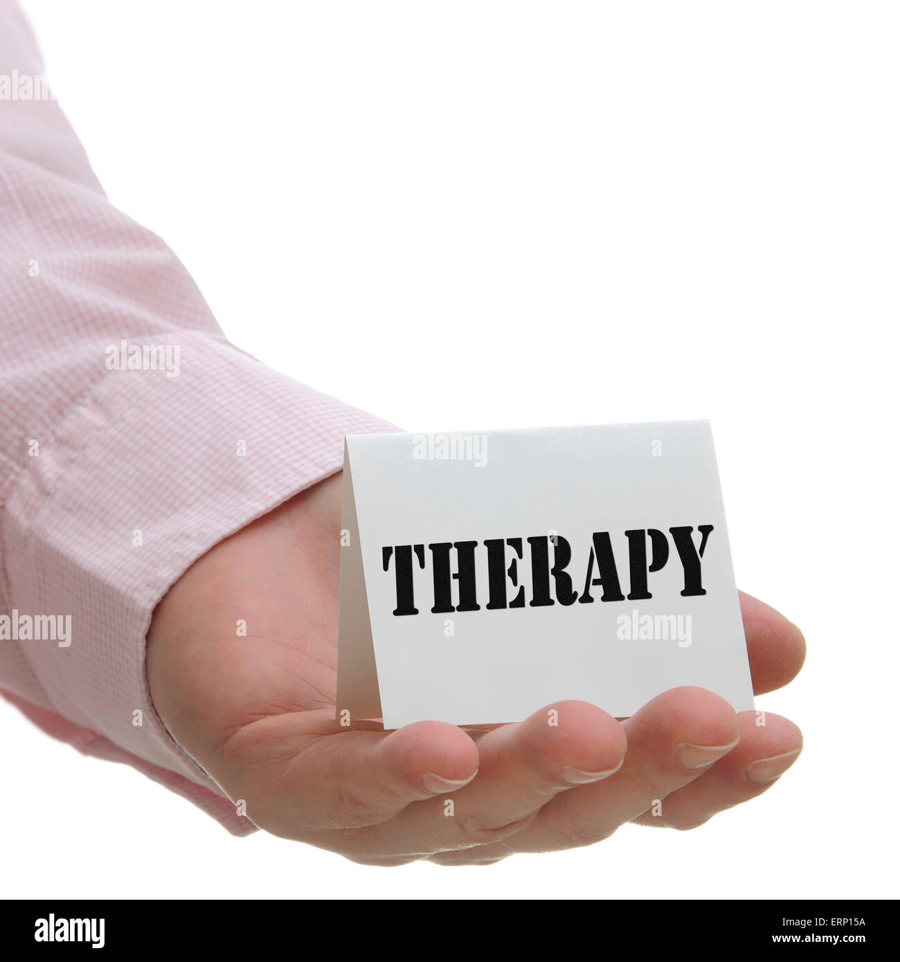 Business man holding therapy sign on hand Stock Photo - Alamy