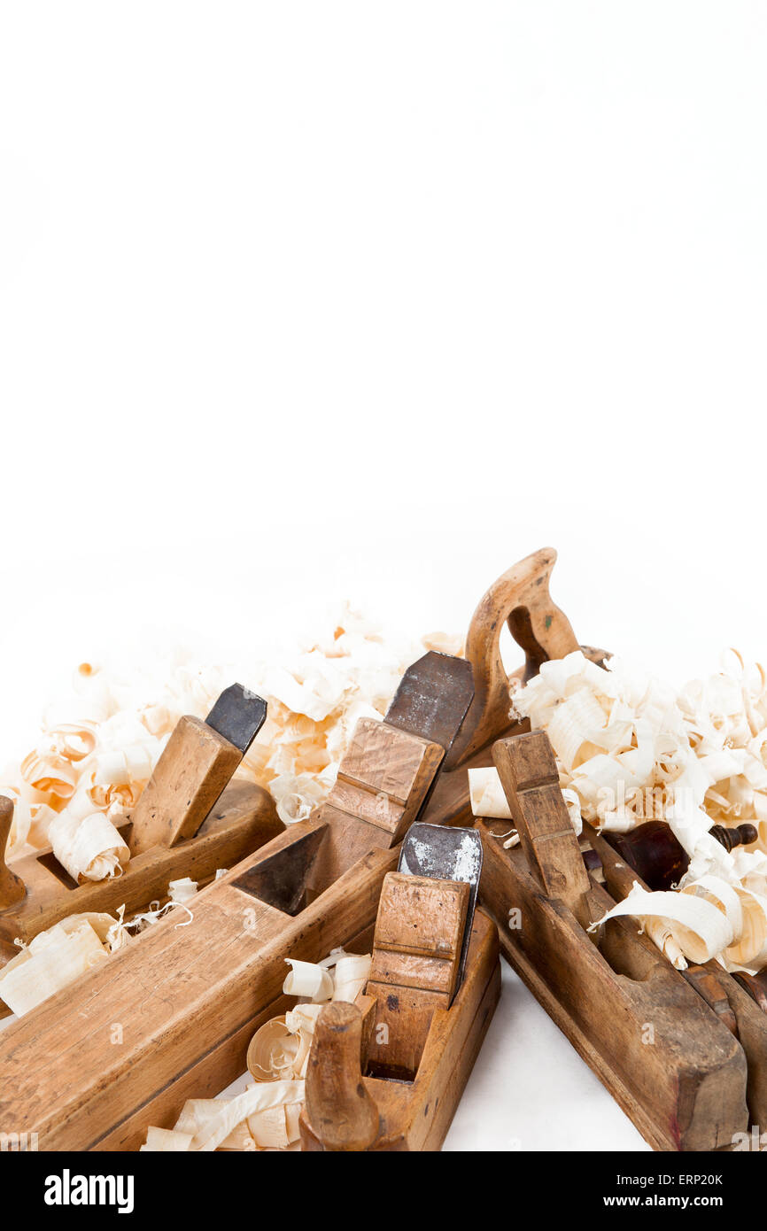 planers with wooden chips, wood shavings isolated on white background ...