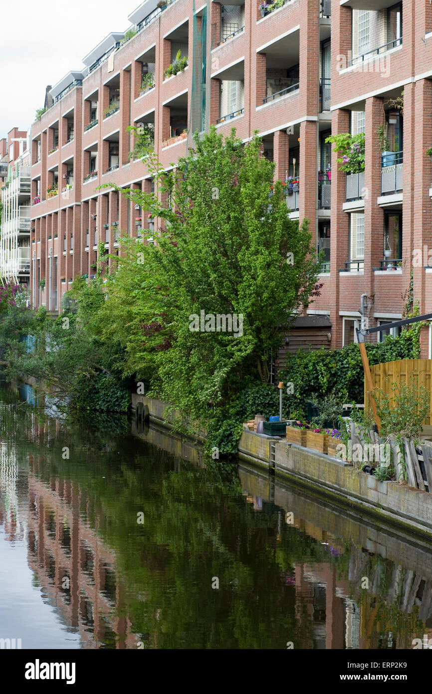 Apartments on the waterways of Amsterdam Holland Stock Photo - Alamy