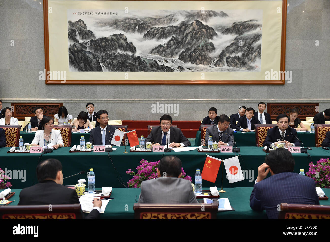 Beijing, China. 6th June, 2015. Chinese Finance Minister Lou Jiwei (C ...