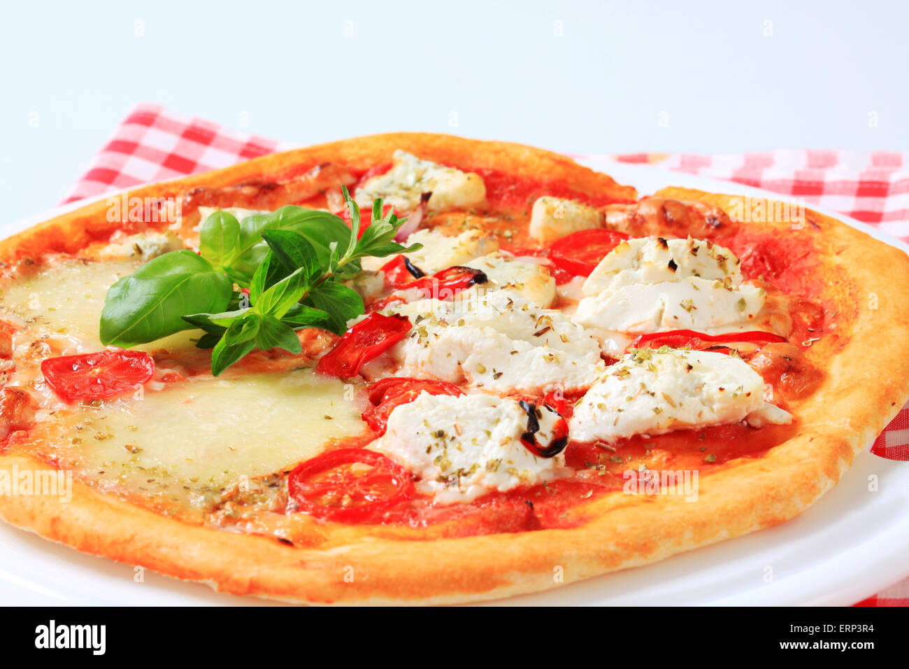 Fresh baked pizza quattro formaggi Stock Photo - Alamy