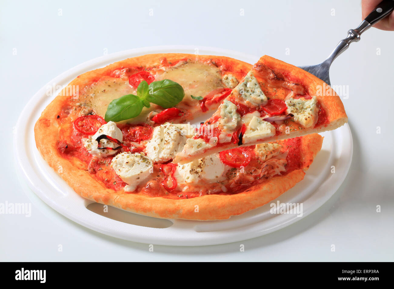 Fresh baked pizza quattro formaggi Stock Photo - Alamy