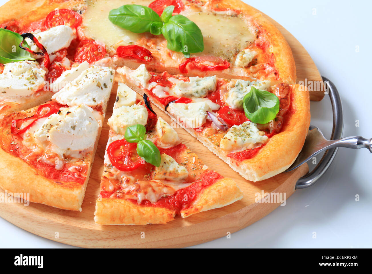 Fresh baked pizza quattro formaggi Stock Photo - Alamy