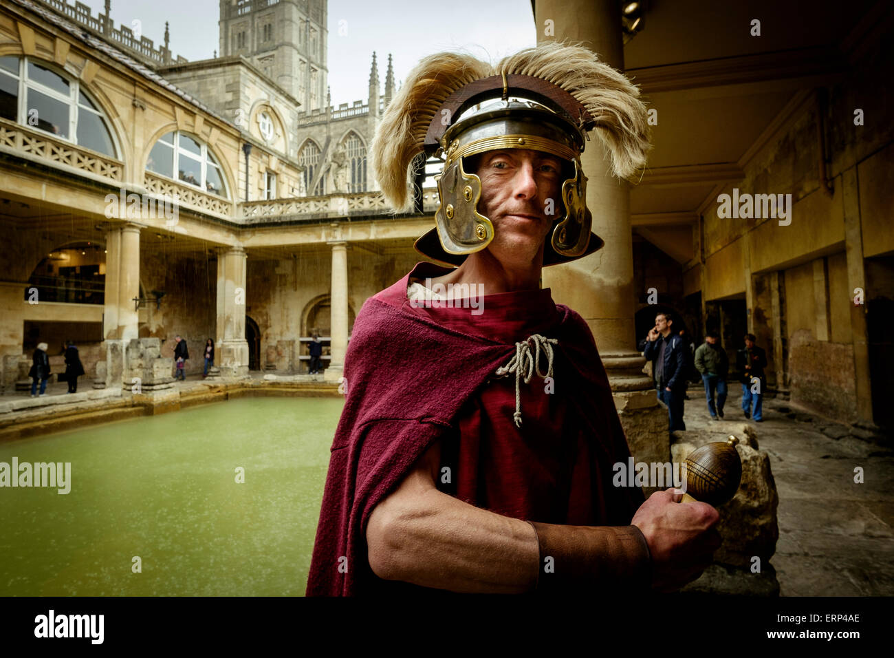 In the Roman Baths at Bath, UK this costumed man acts as a guide and ...