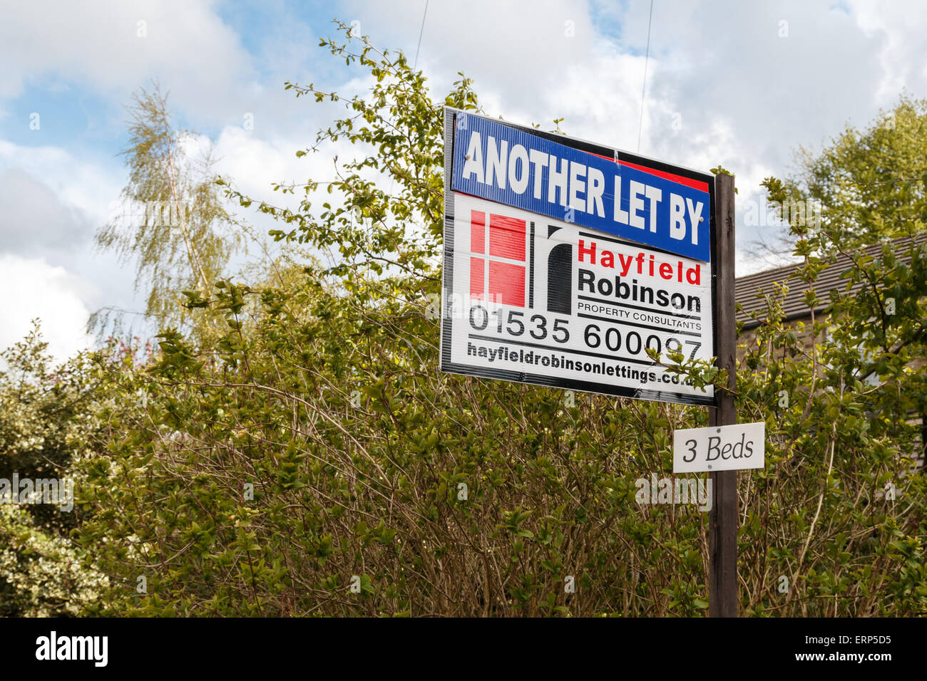 Property let by sign on a cottage in rural Yorkshire, England Stock ...