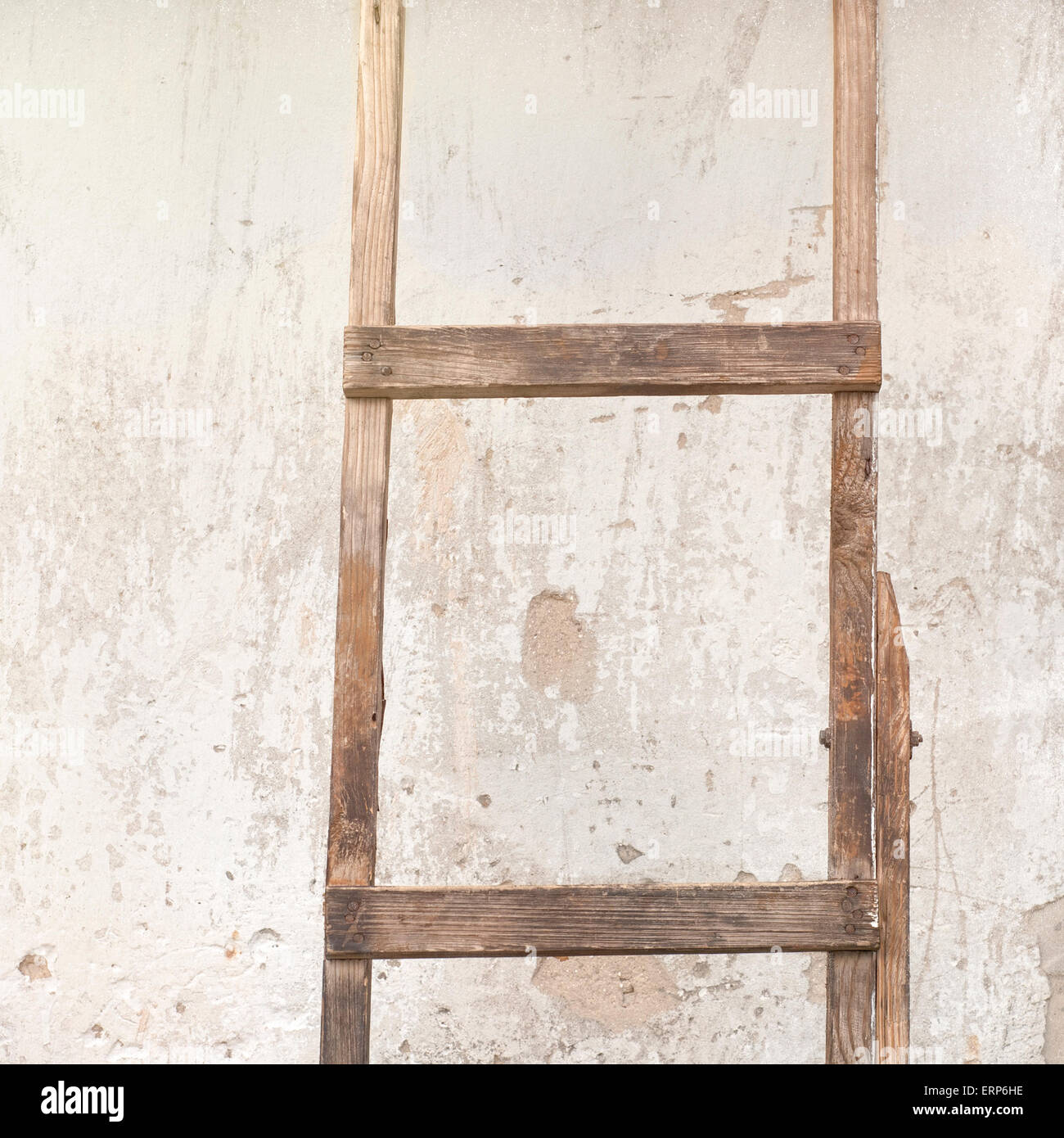 weathered stucco wall with wooden ladder Stock Photo - Alamy