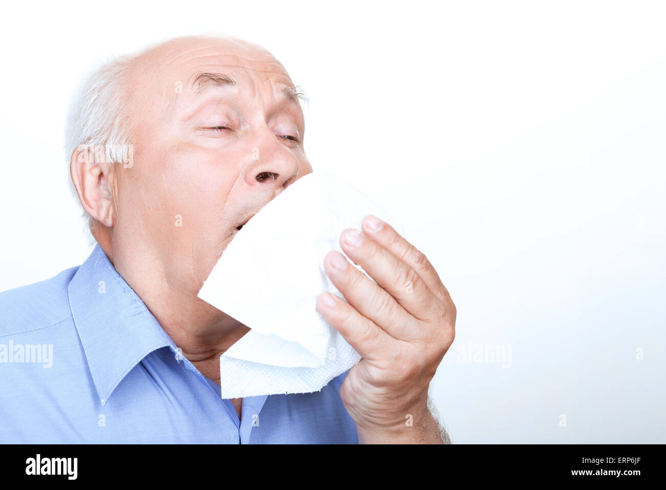 Ill grandfather holding handkerchief Stock Photo - Alamy
