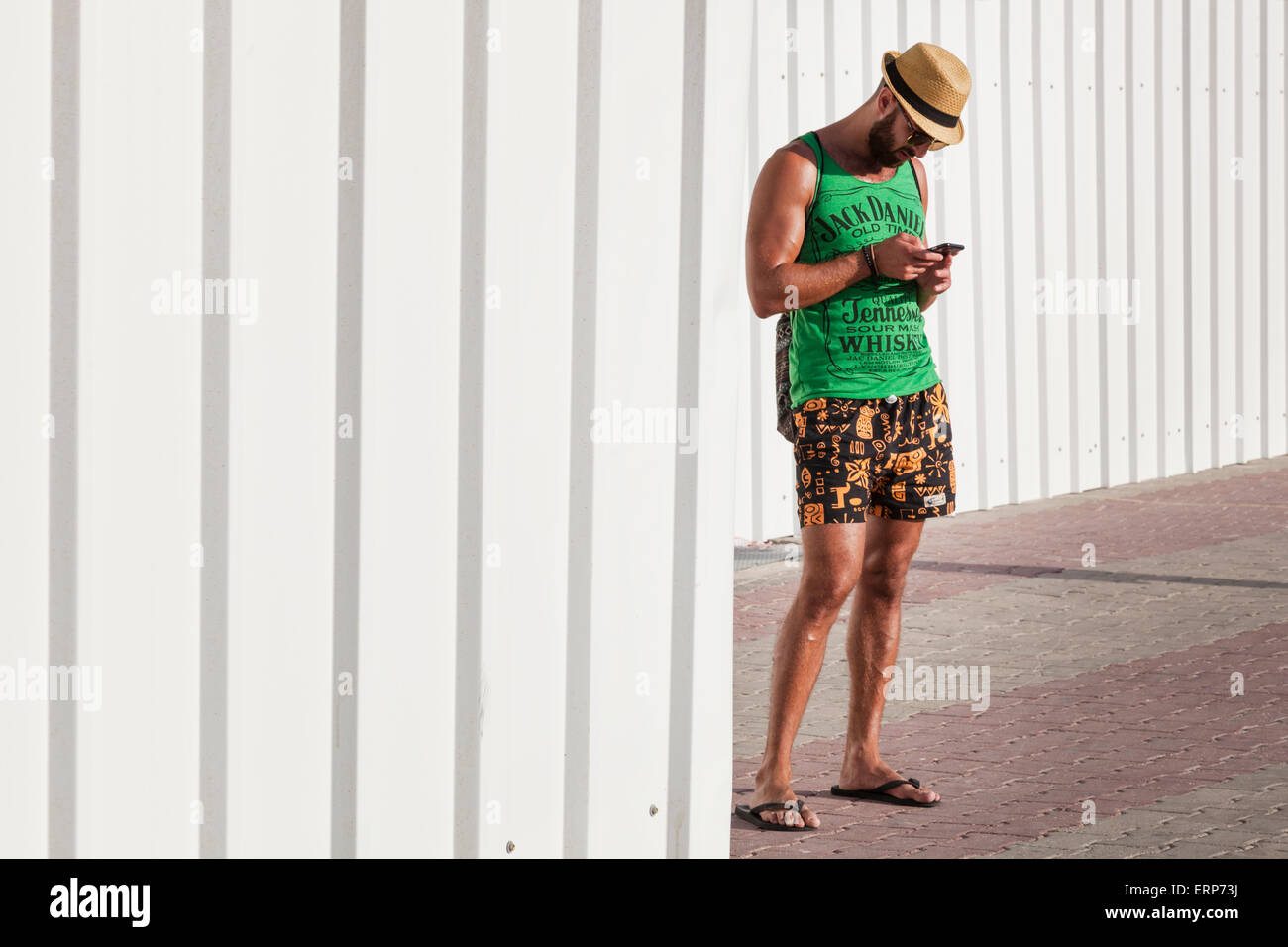 man looking at his mobile phone in Tel Aviv, Israel Stock Photo - Alamy