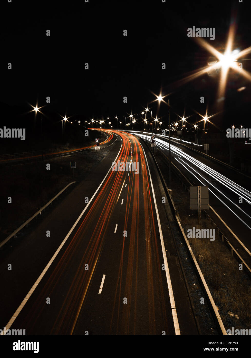 Road at night Stock Photo - Alamy