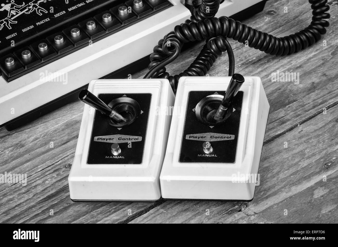 Old game console with very simple wired joysiticks Stock Photo - Alamy