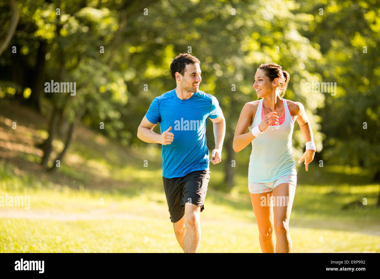 Running couple hi-res stock photography and images - Alamy
