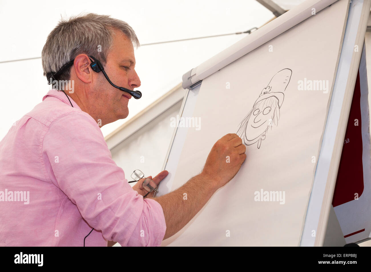 Axel Scheffler gives a presentation and makes drawings of his ...