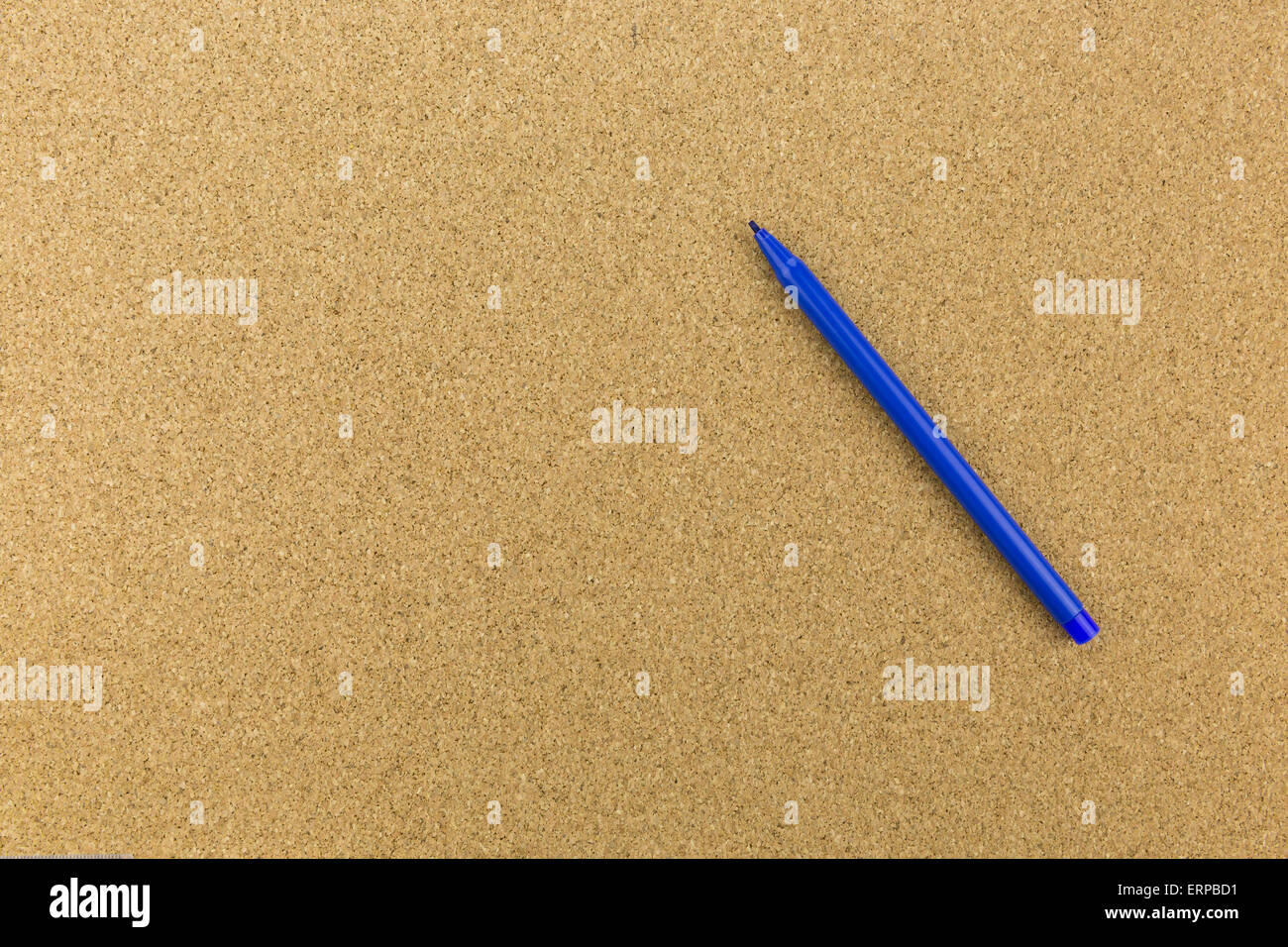 blue marker place on cork board Stock Photo - Alamy