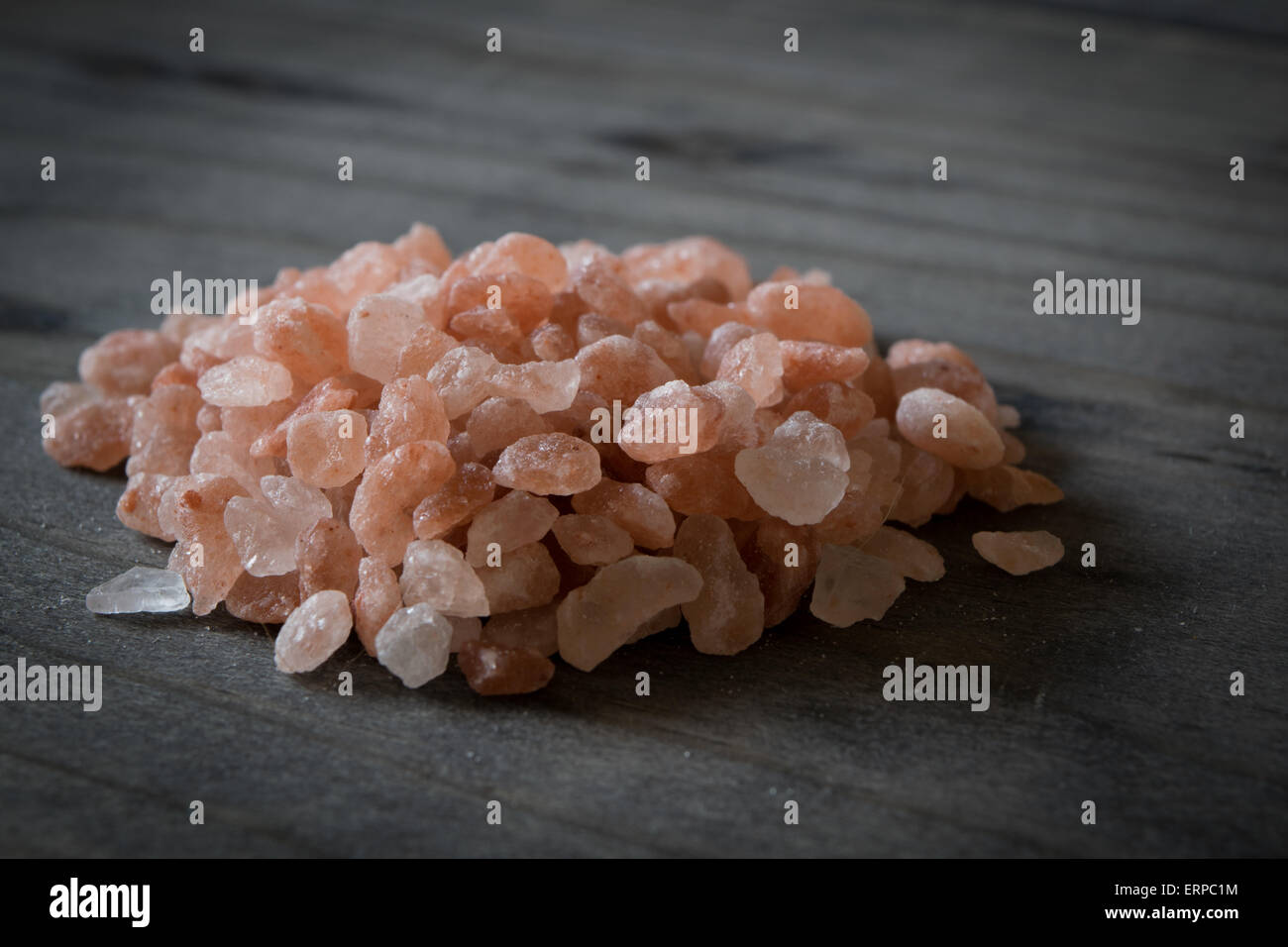 Pink Himalayan Sea Salt on Wooden Table Stock Photo - Alamy