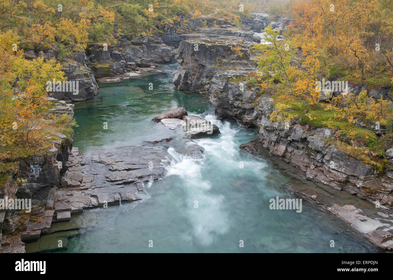 Short river and rapids up North. Canyon with rocks and cliffs ...