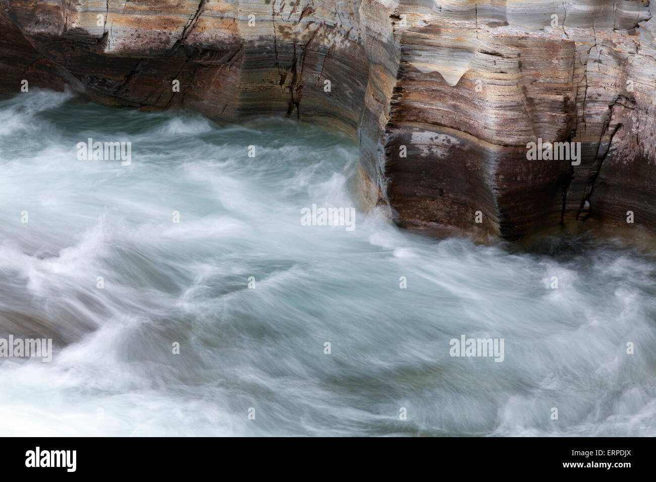 Short river and rapid up North. Canyon with rocks, cliffs and water in ...