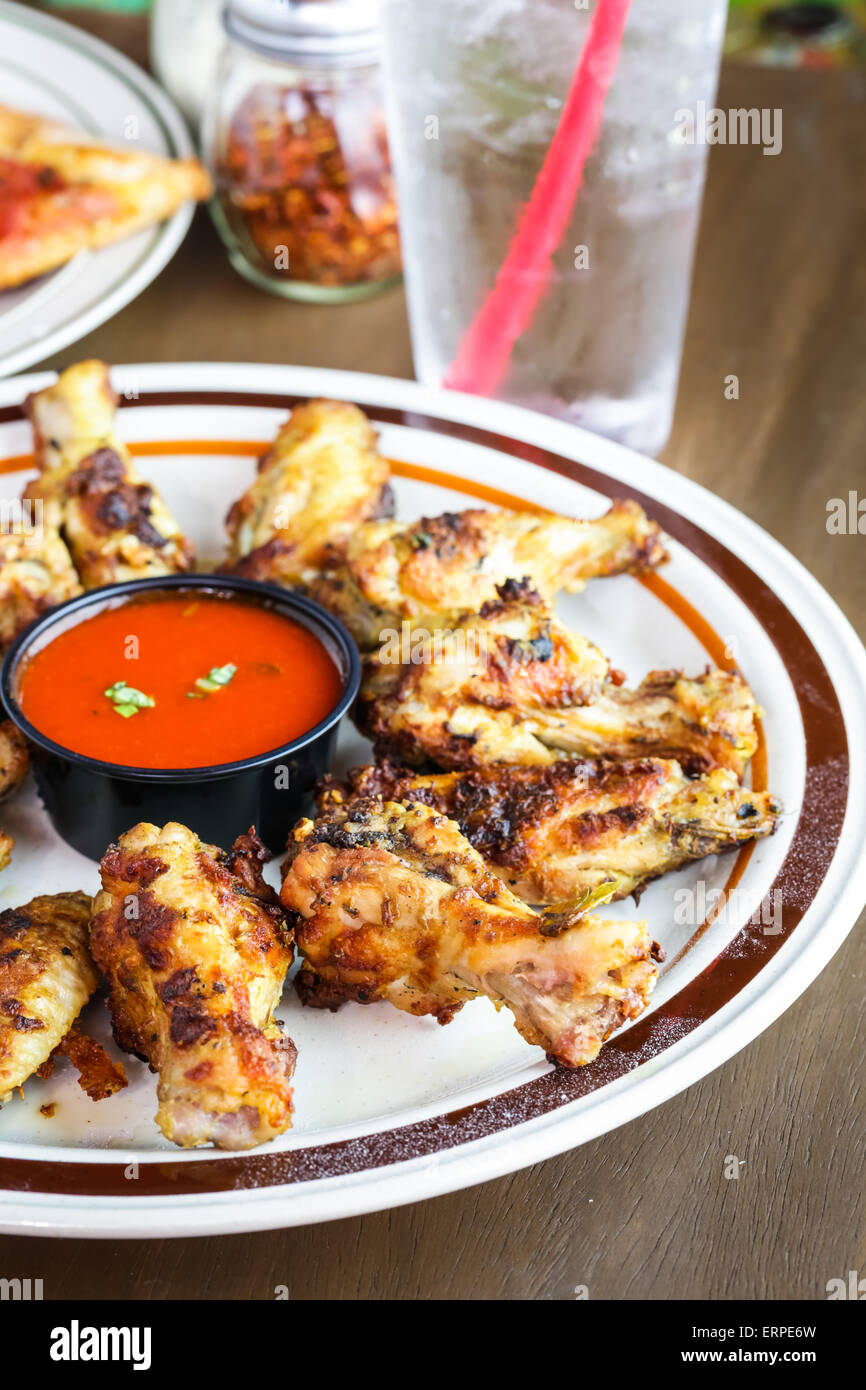 Appetizer plate with wood fired oven chicken wings Stock Photo - Alamy