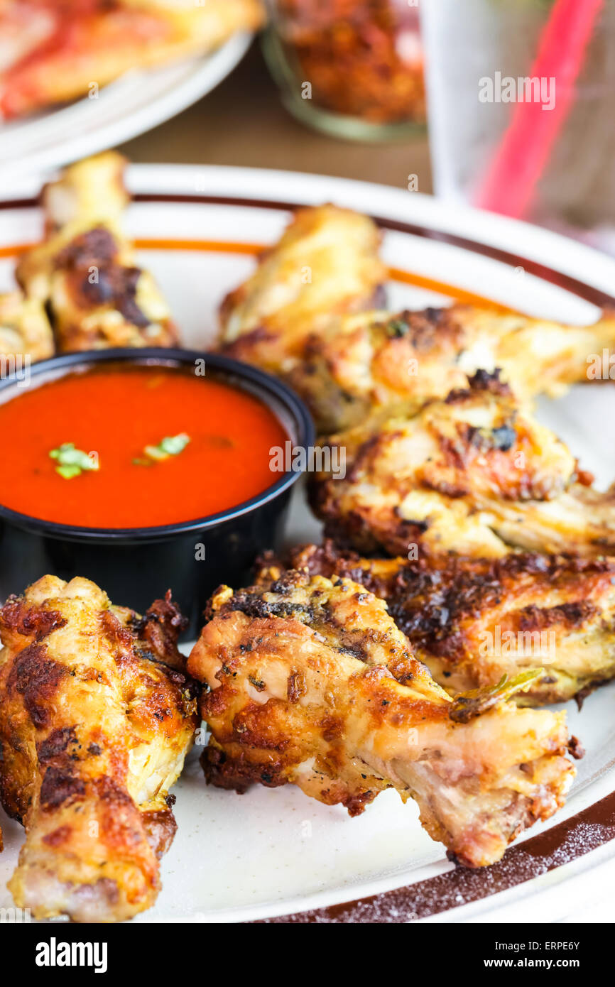 Appetizer plate with wood fired oven chicken wings Stock Photo - Alamy