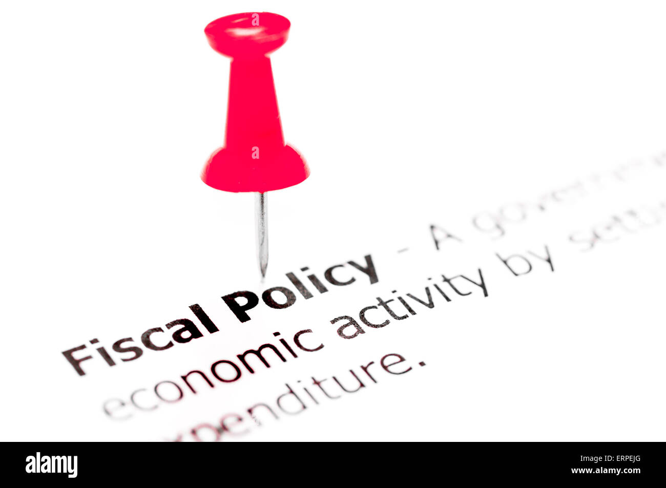 Words FISCAL POLICY pinned on white paper with red pushpin, available ...