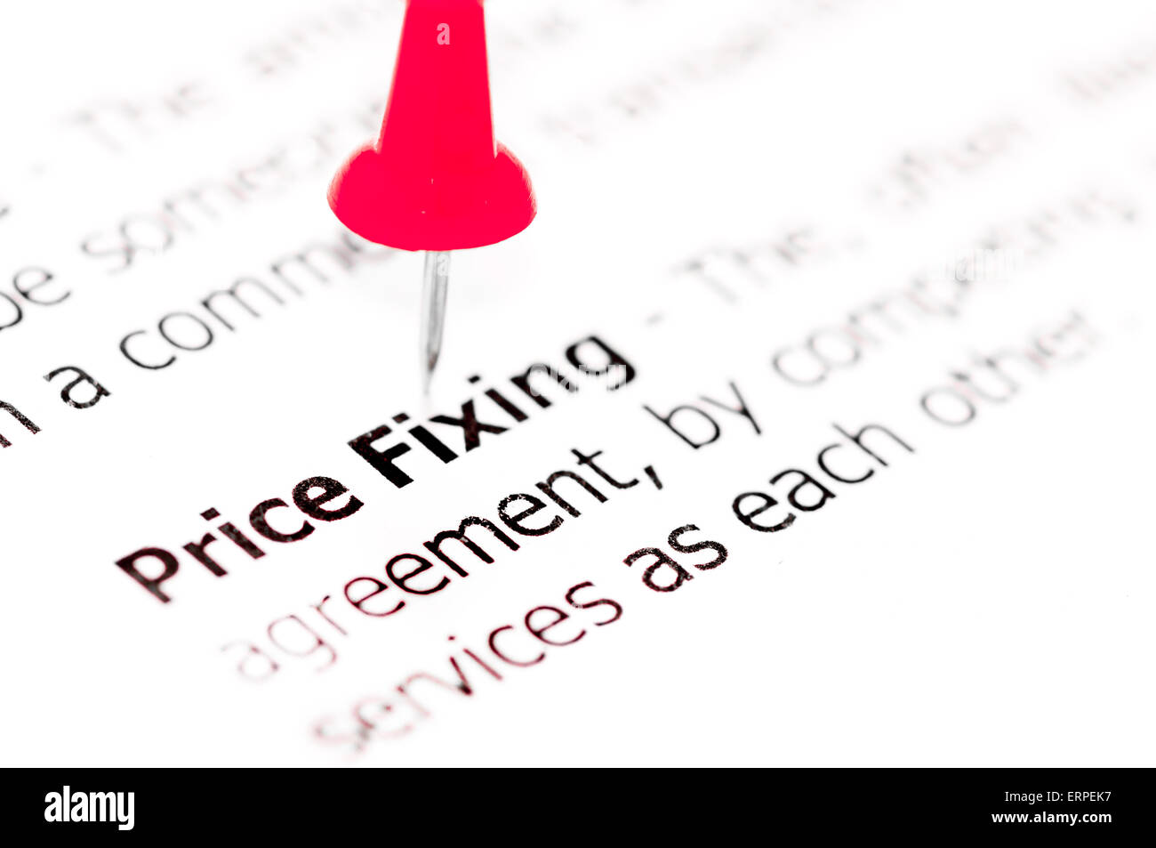 Words PRICE FIXING pinned on white paper with red pushpin, available ...