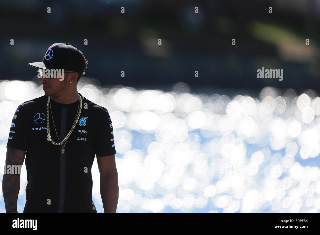 Lewis hamilton arrives in the paddock hi-res stock photography and ...