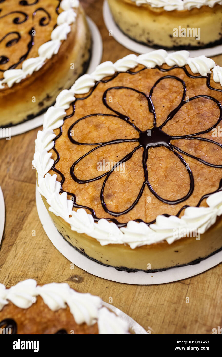 Cheesecakes prepared in the kitchen of Italian restaurant Stock Photo ...