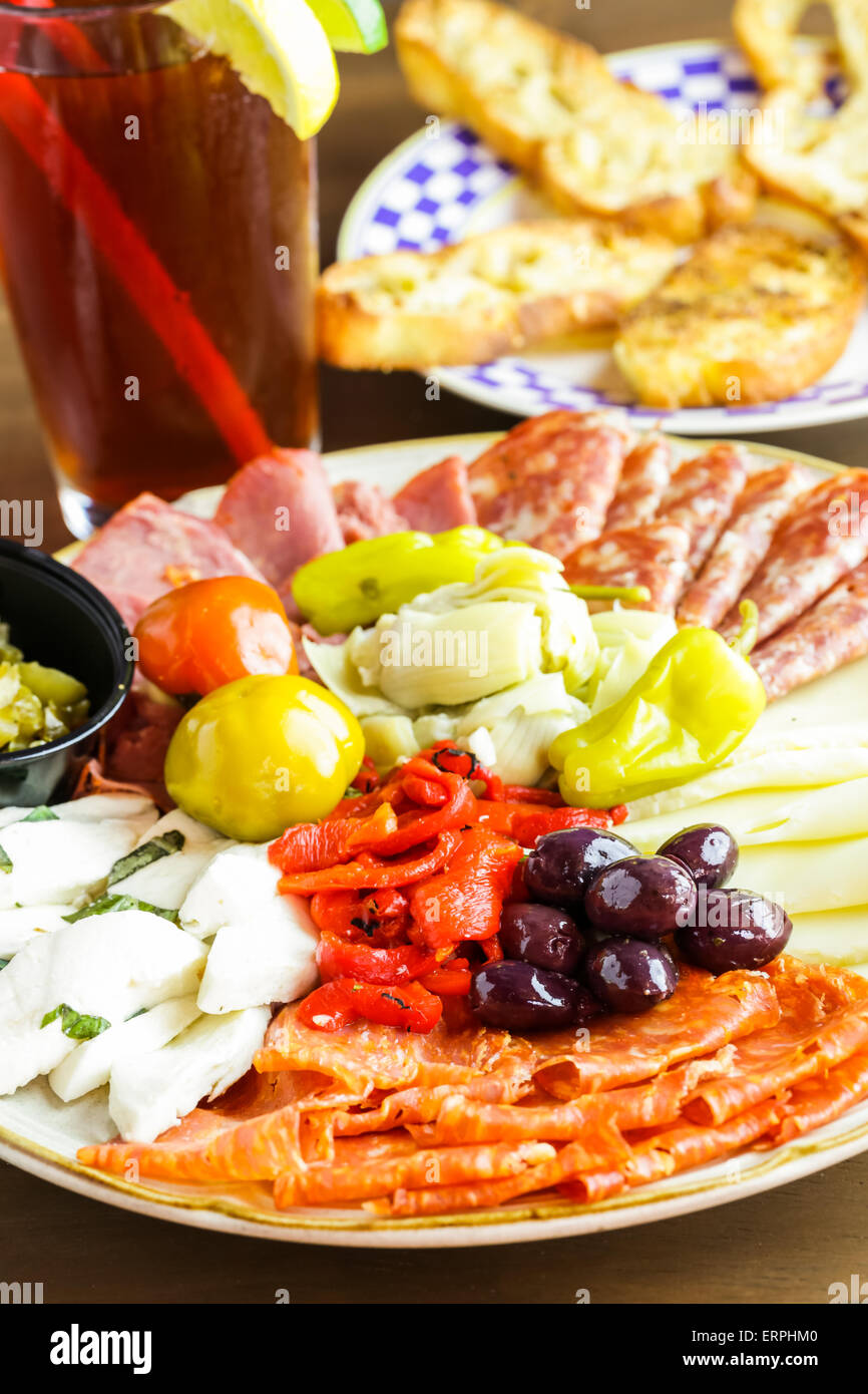 Appetizers plate with antipasto in Italian restaurant Stock Photo - Alamy