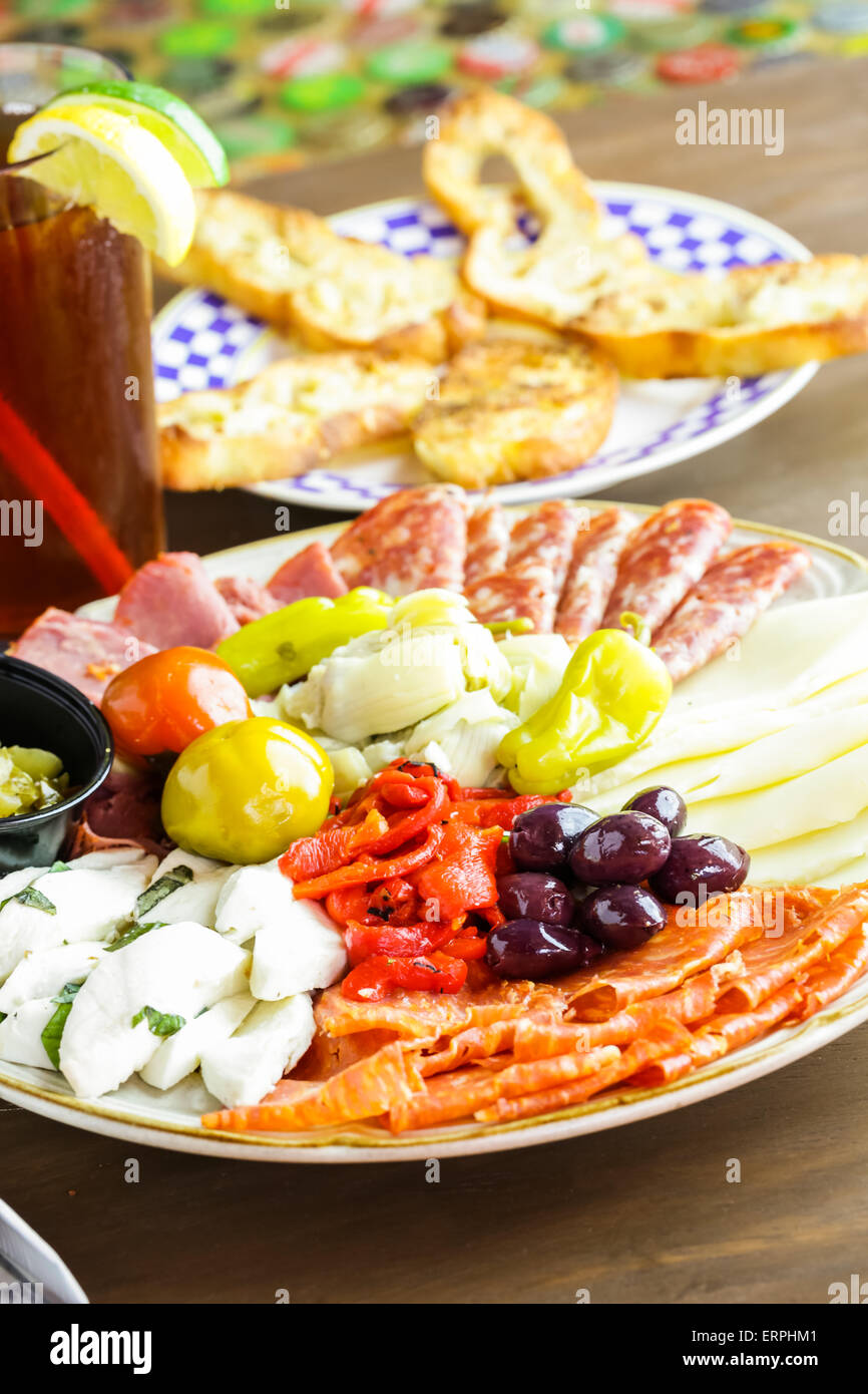 Appetizers plate with antipasto in Italian restaurant Stock Photo - Alamy