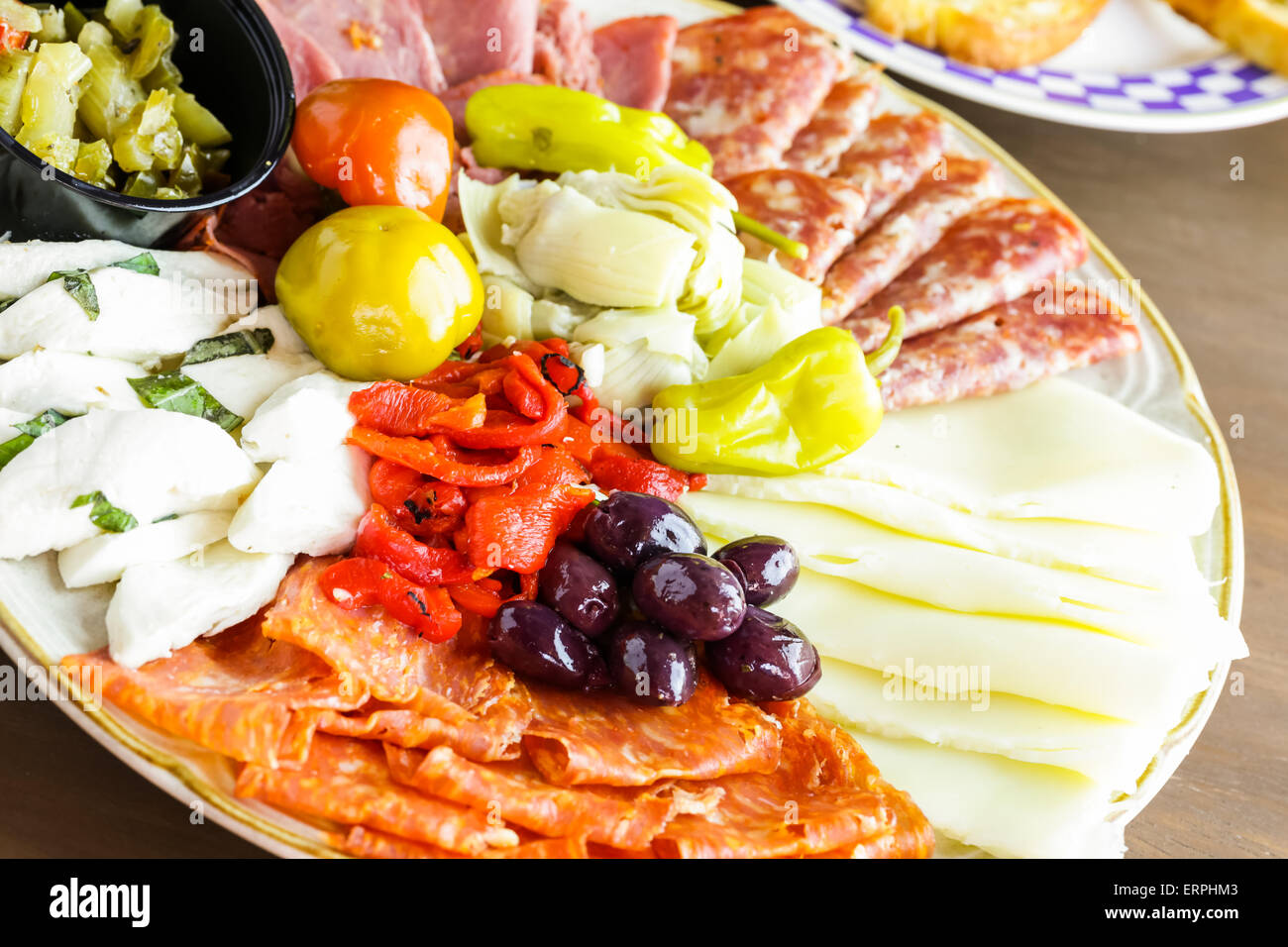 Appetizers plate with antipasto in Italian restaurant Stock Photo - Alamy