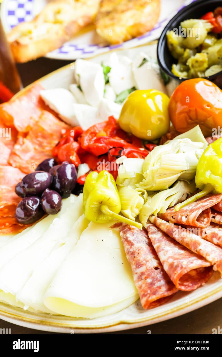 Appetizers plate with antipasto in Italian restaurant Stock Photo - Alamy